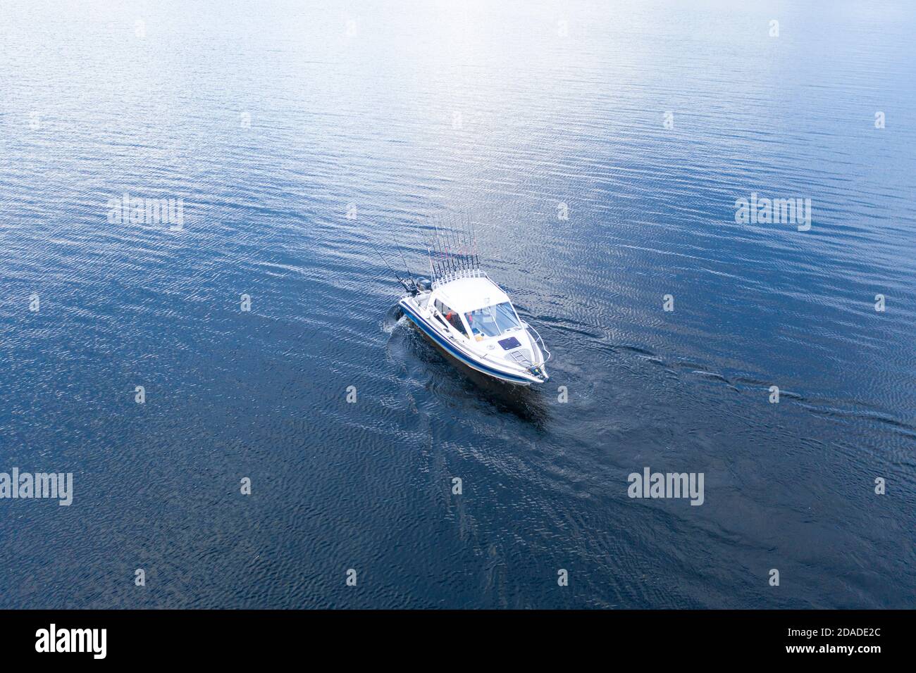 Aerial view fisherman on boat at the ocean. Top view beautiful seascape ...