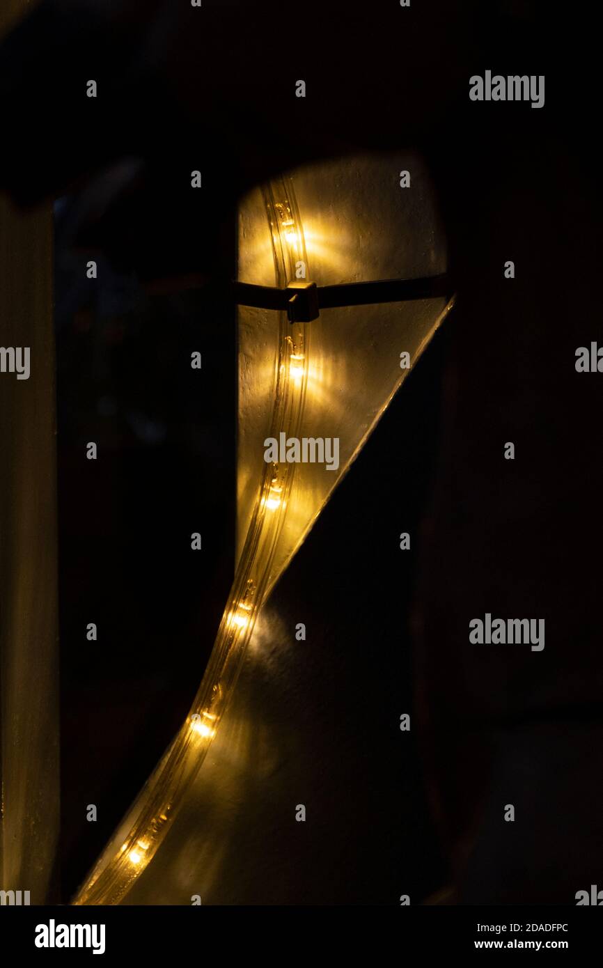 Lights wrapped around a tree hi-res stock photography and images - Alamy