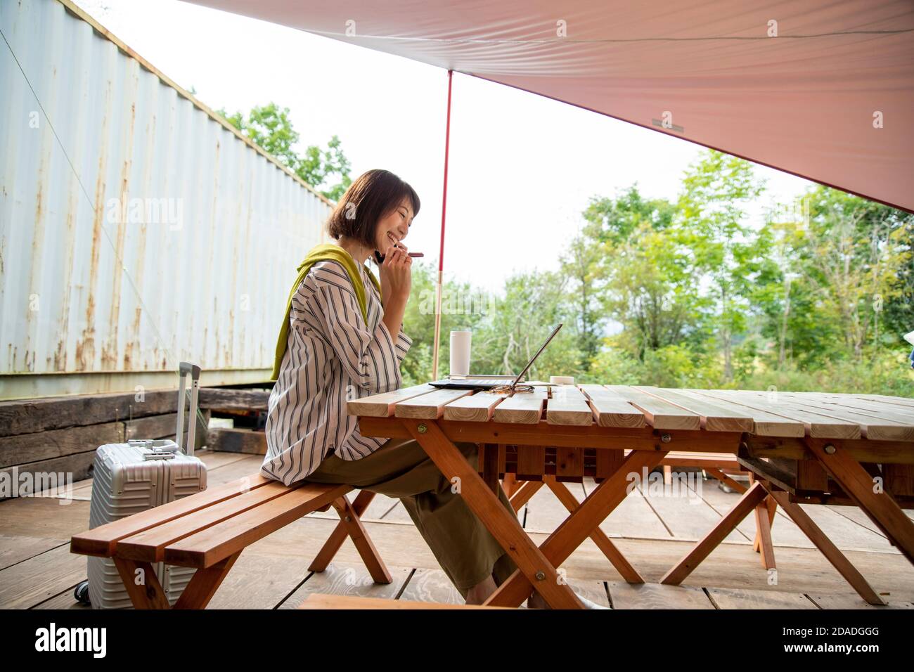Woman Teleworking on an Outdoor Office as New Normal Work Style Stock ...