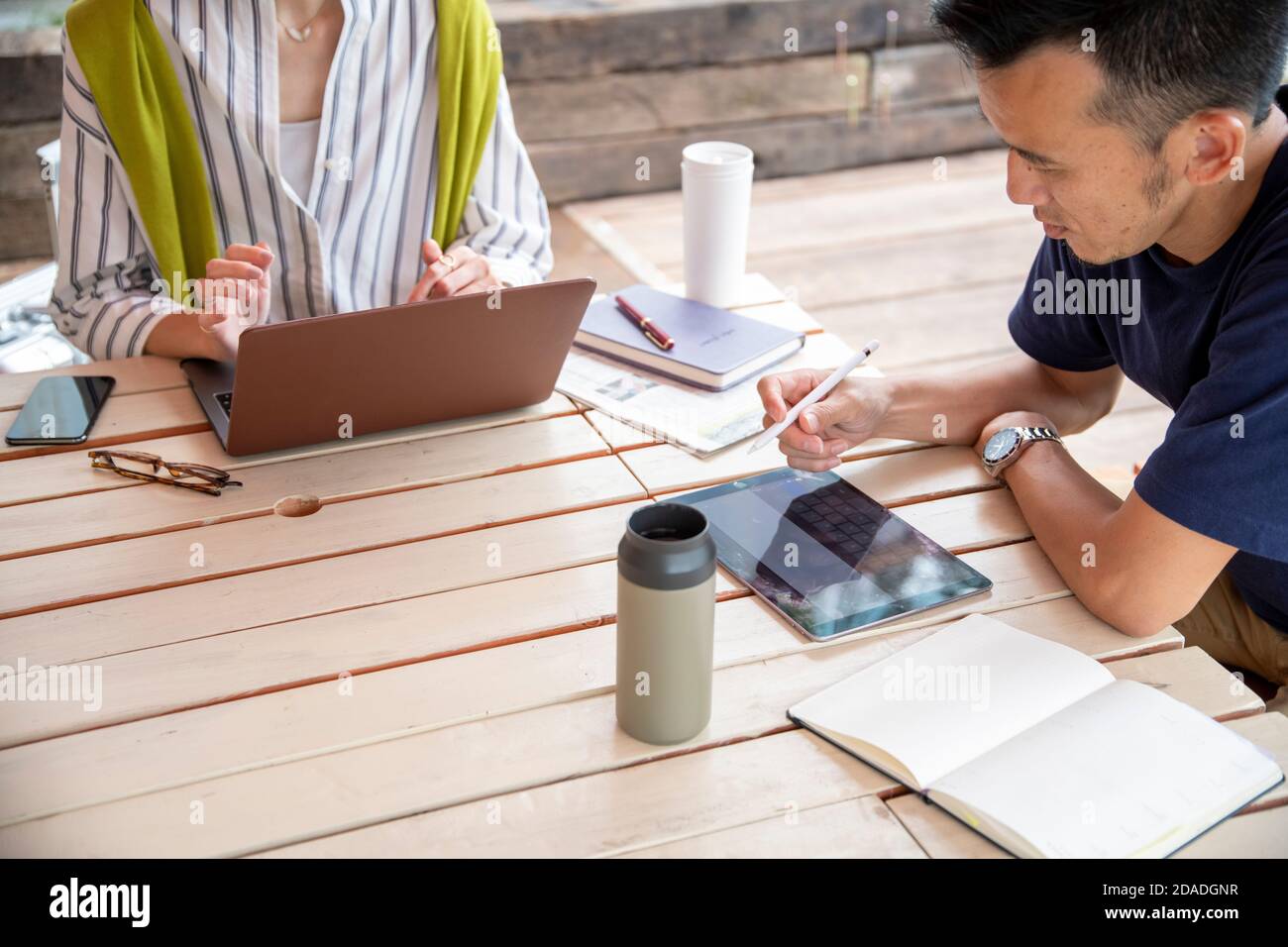 Man and Woman Having a Meeting on an Outdoor Office as New Normal Work ...