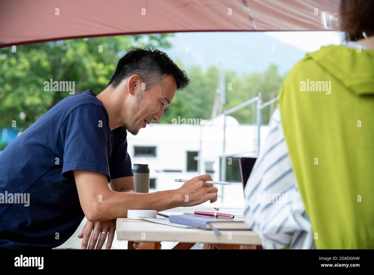 Man and Woman Having a Meeting on an Outdoor Office as New Normal Work ...