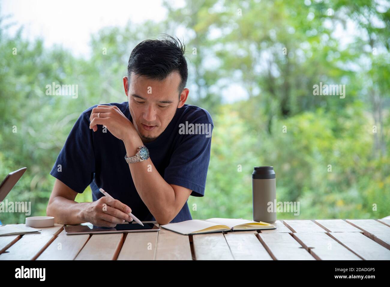 Man Teleworking on an Outdoor Office as New Normal Work Style Stock ...