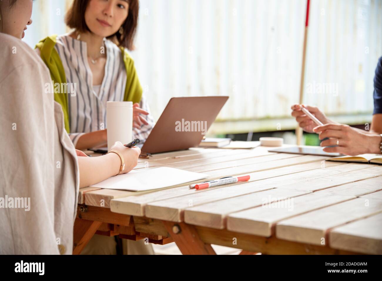 Man and Women Having a Meeting on an Outdoor Office as New Normal Work ...
