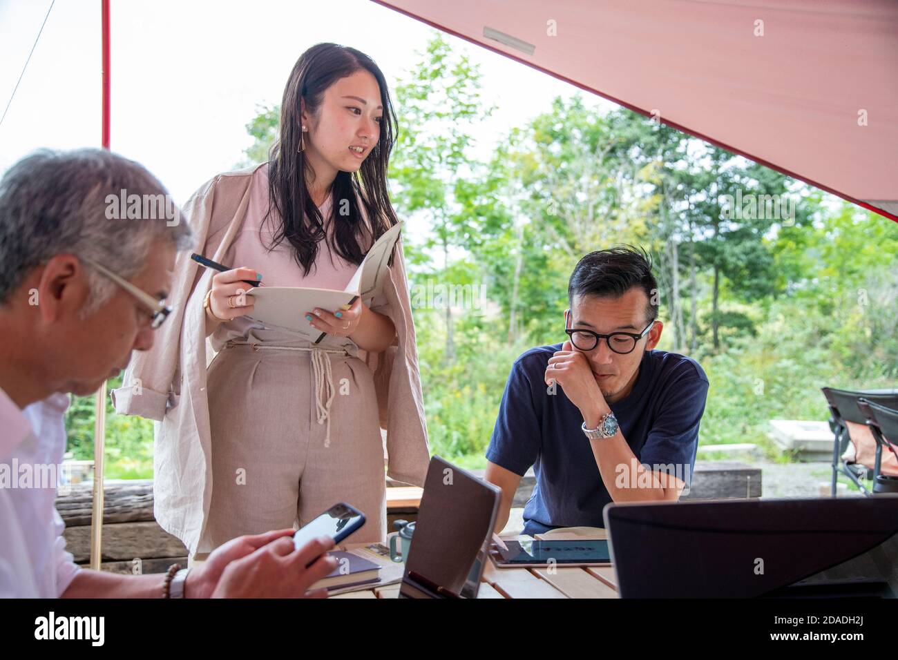 Men and Woman Having a Meeting on an Outdoor Office as New Normal Work ...