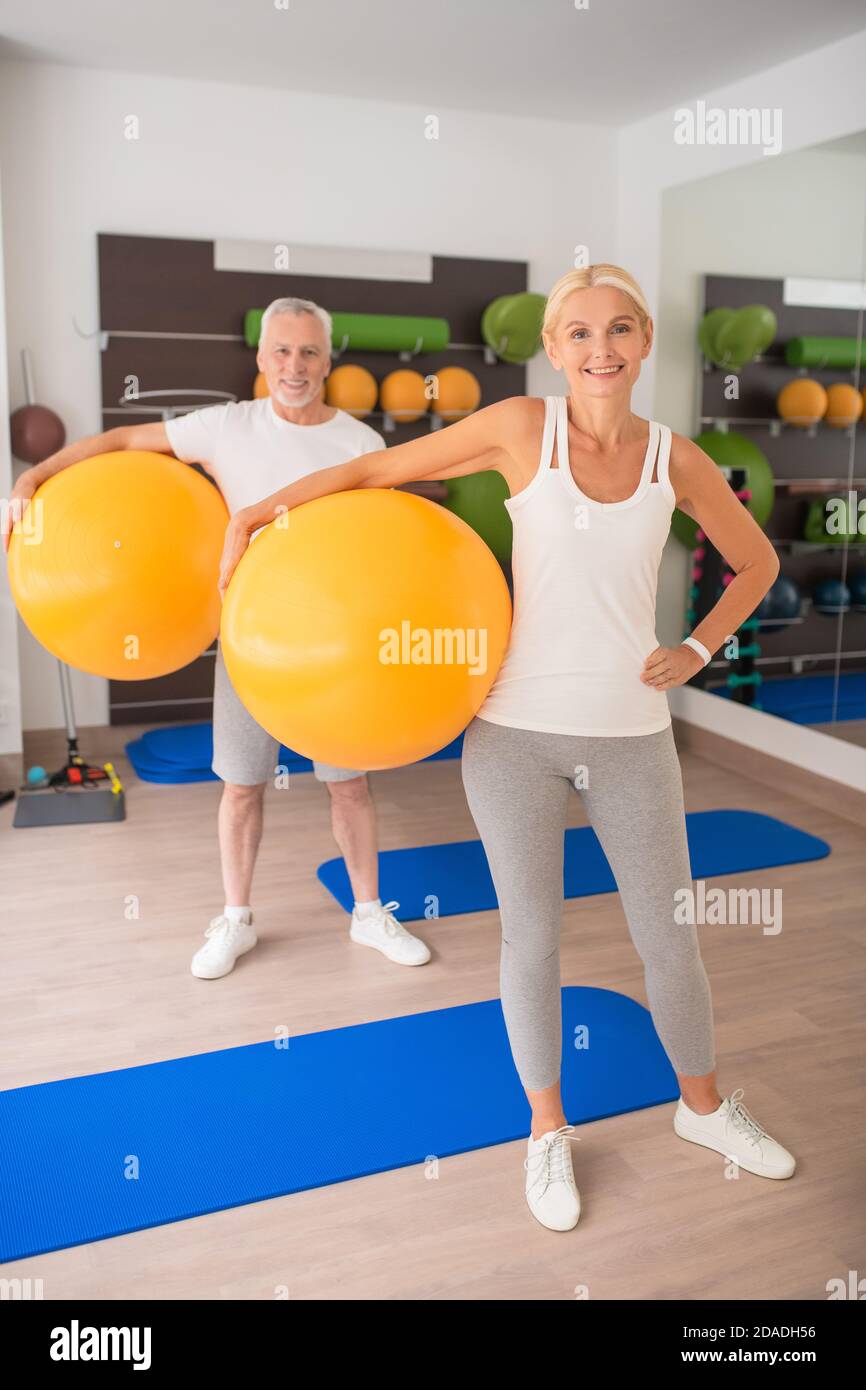 Middle-aged couple having a fitness workout and feeling good Stock ...