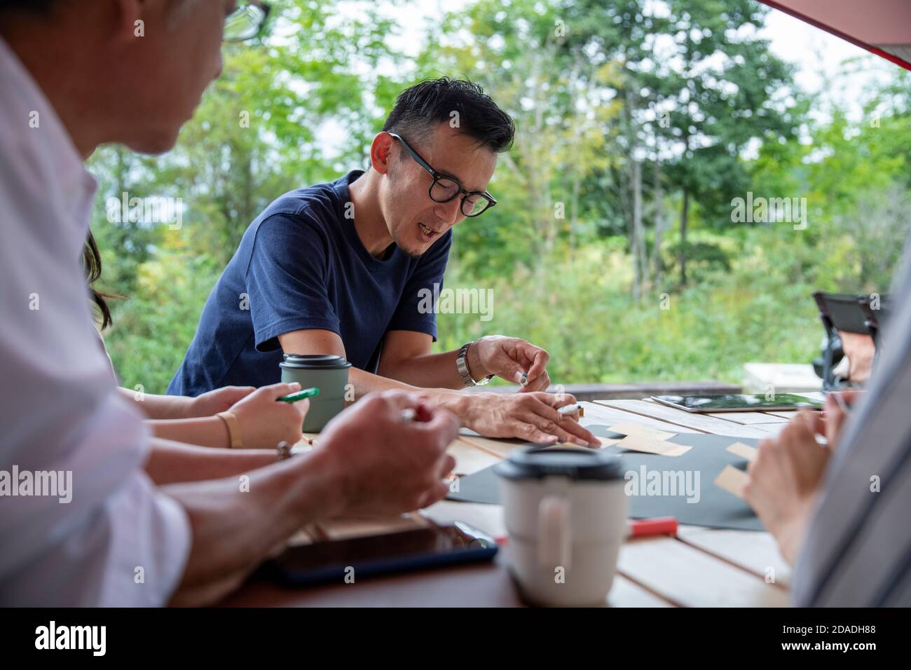 Man and Woman Having a Meeting on an Outdoor Office as New Normal Work ...