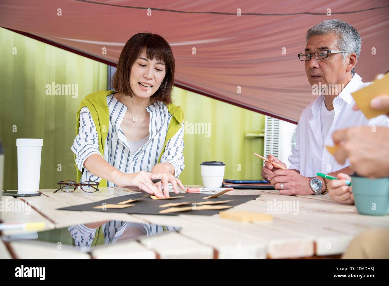 Man and Woman Having a Meeting on an Outdoor Office as New Normal Work ...