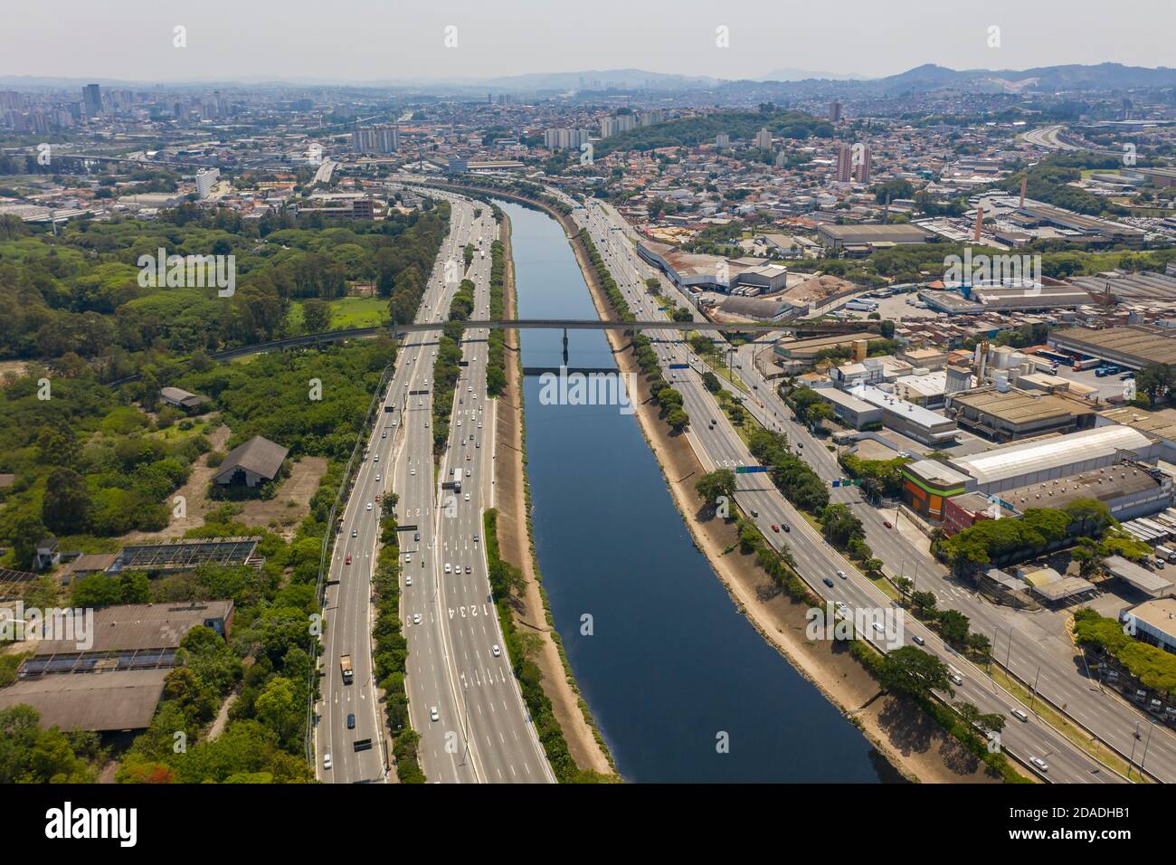 Aerial view of the river between the roads Stock Photo - Alamy