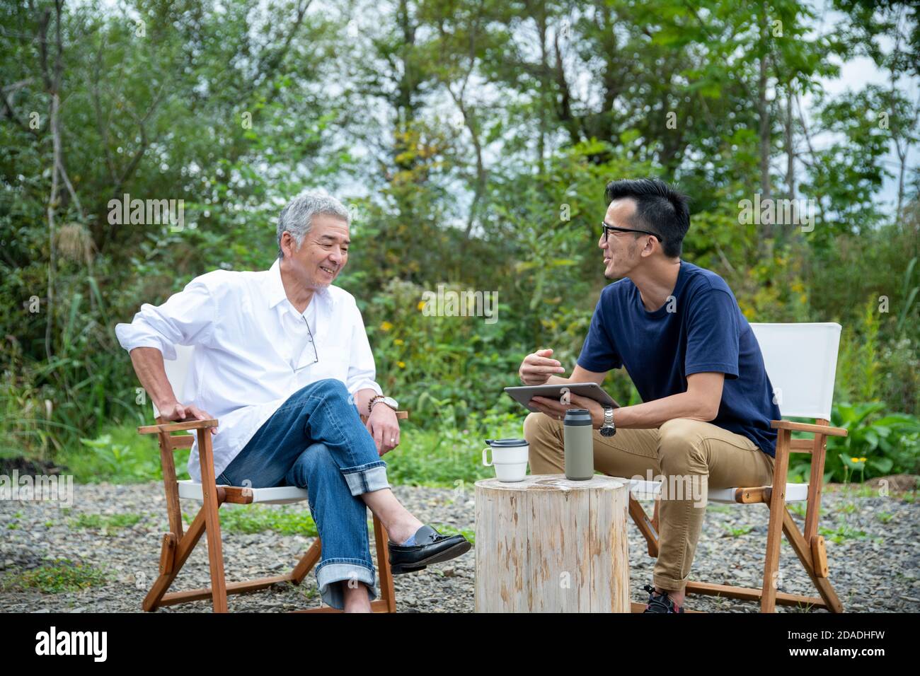 Boss and Staff Laughing Stock Photo - Alamy