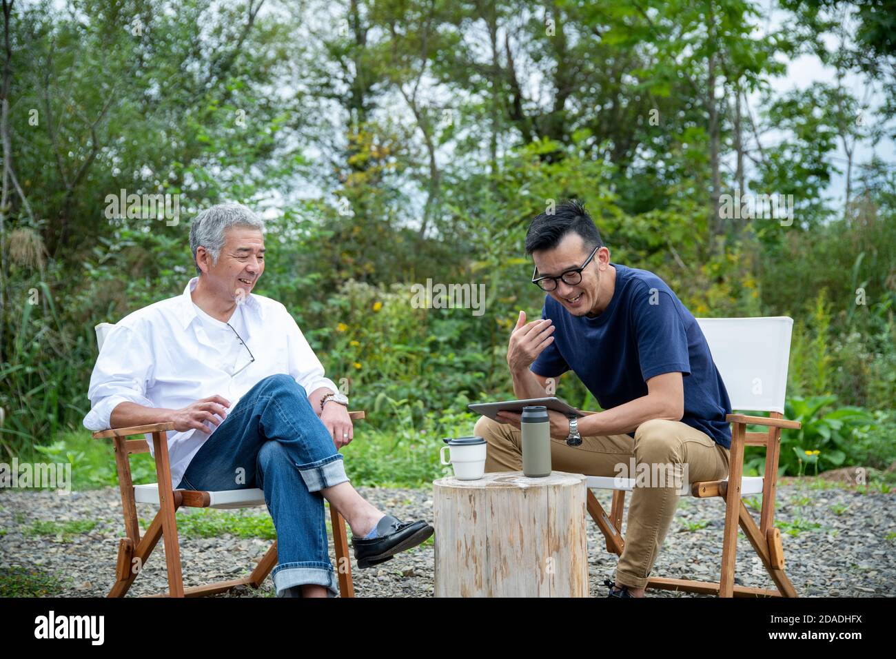 Boss and Staff Laughing Stock Photo - Alamy