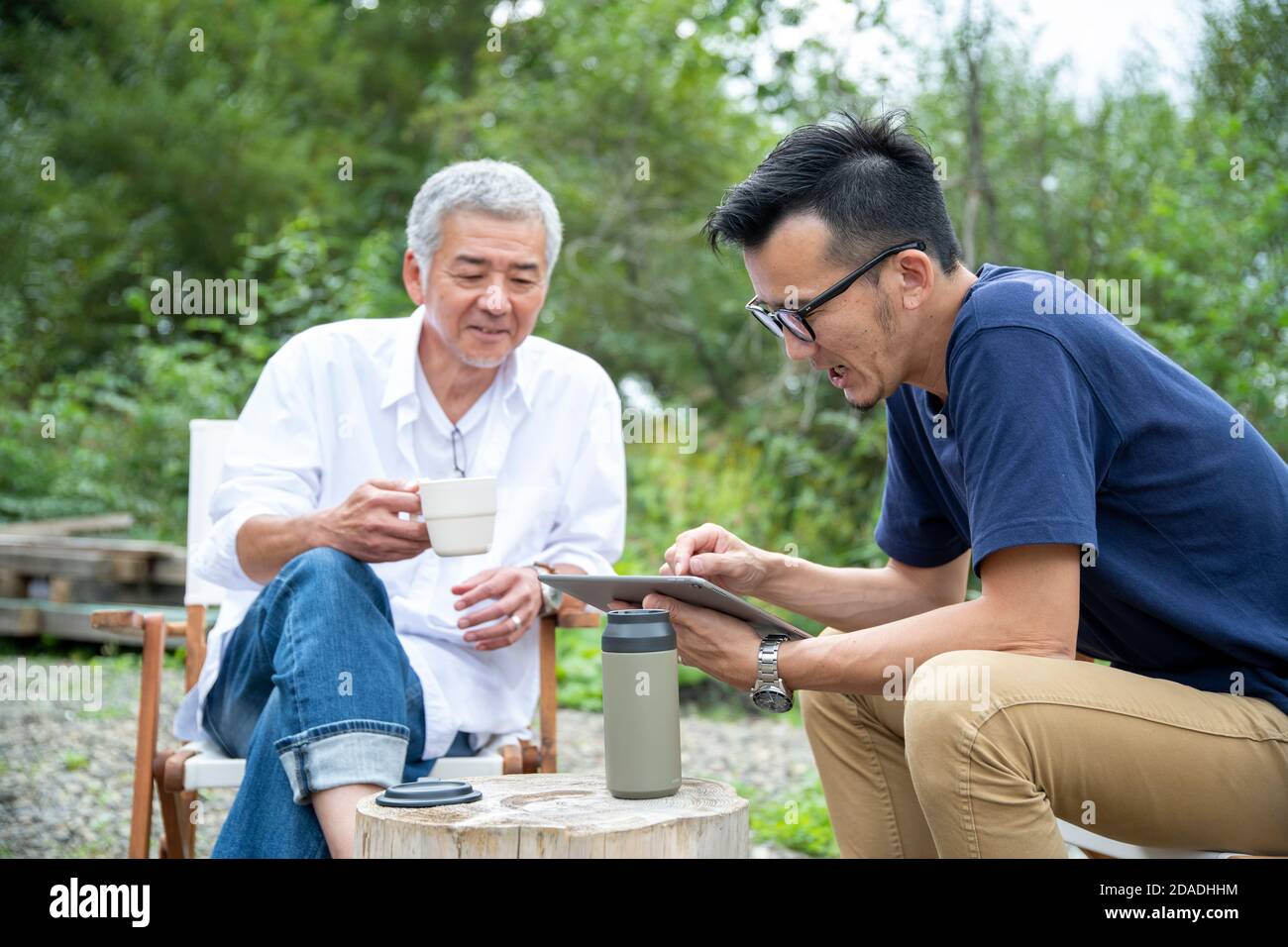 Boss and Staff Laughing Stock Photo - Alamy