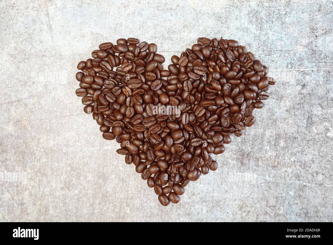 Roasted coffee beans in heart shape Stock Photo - Alamy