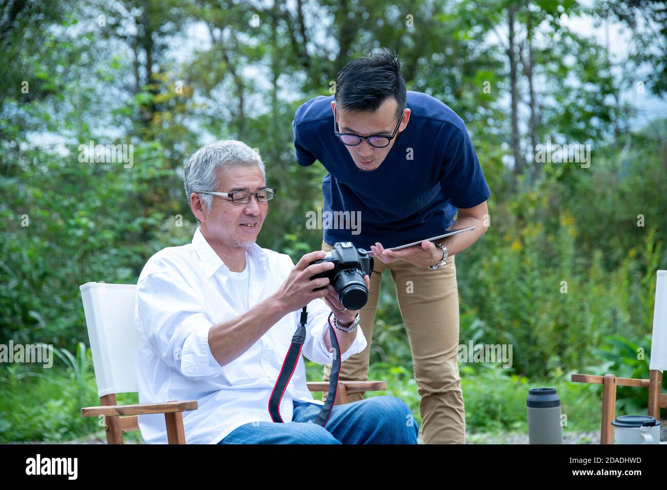Boss and Staff Laughing Stock Photo - Alamy