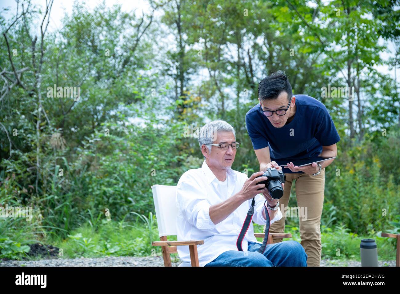 Boss and Staff Laughing Stock Photo - Alamy