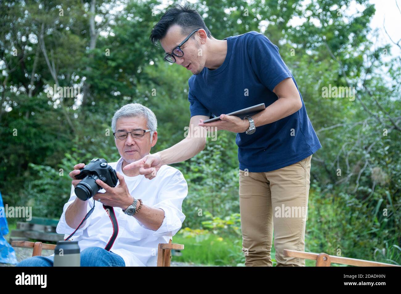 Boss and Staff Laughing Stock Photo - Alamy