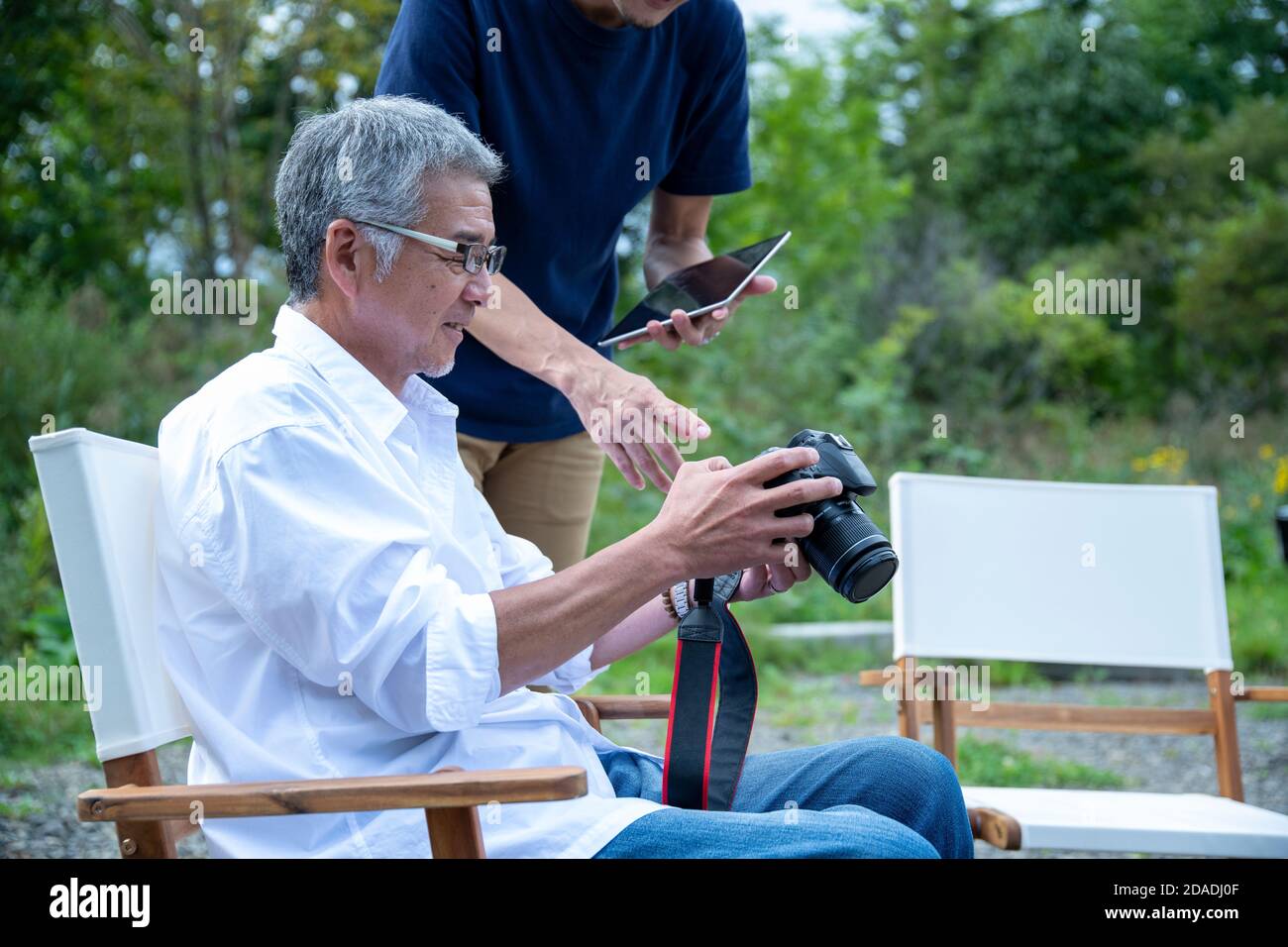 Boss and Staff Laughing Stock Photo - Alamy