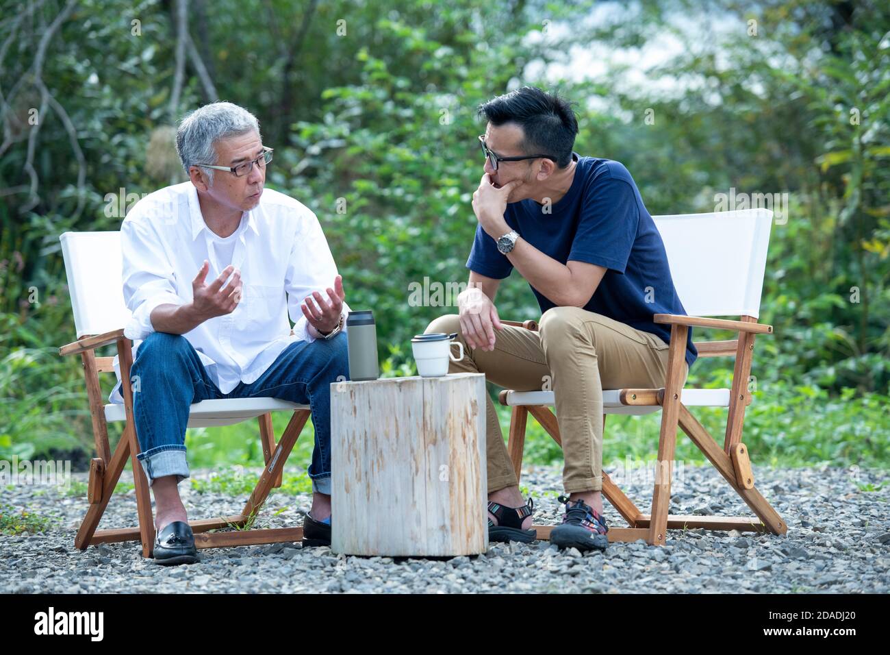 Boss and Staff Laughing Stock Photo - Alamy