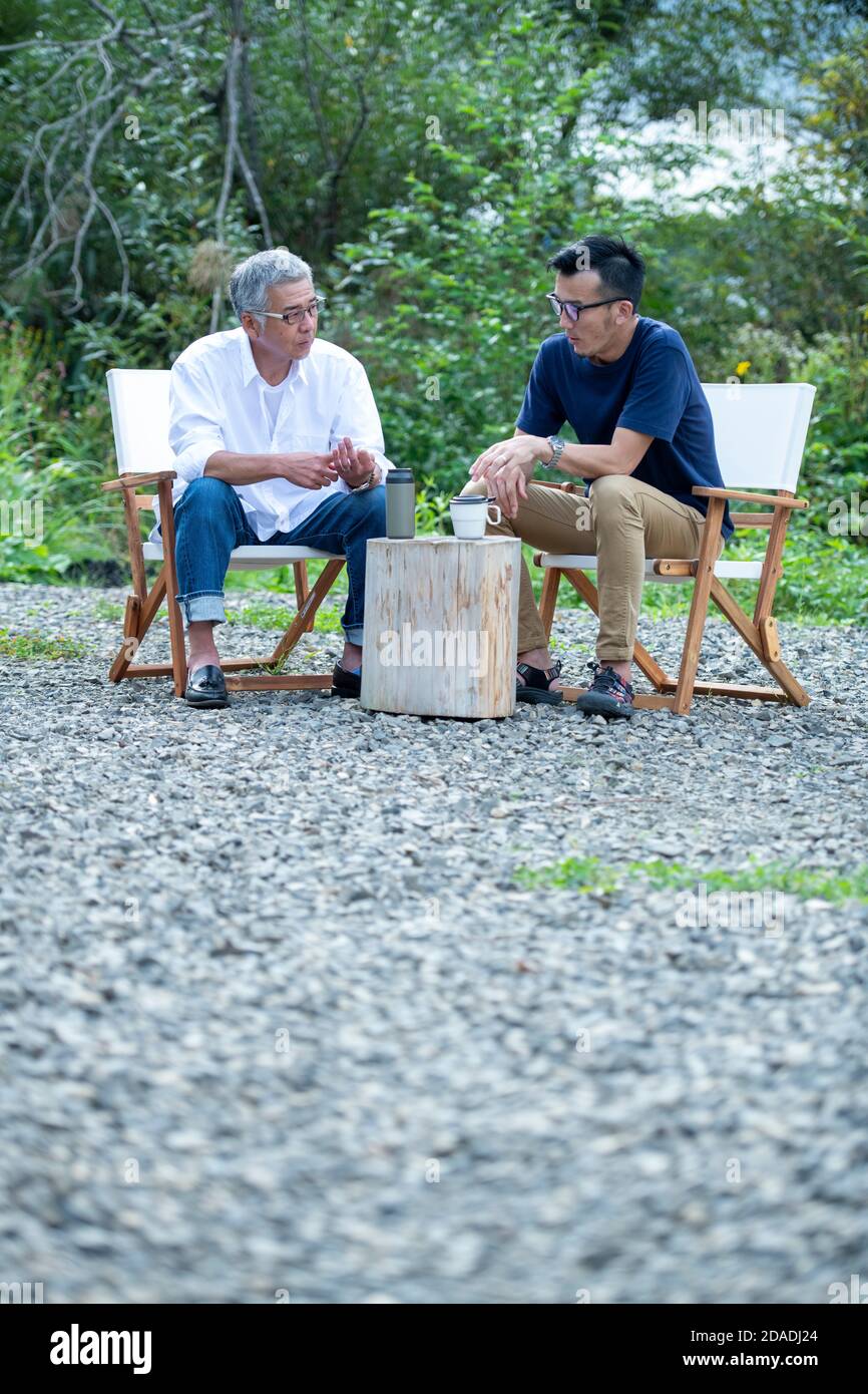 Boss and Staff Laughing Stock Photo - Alamy