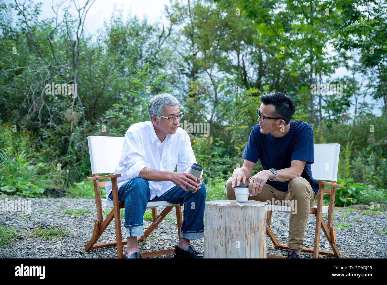 Boss and Staff Laughing Stock Photo - Alamy