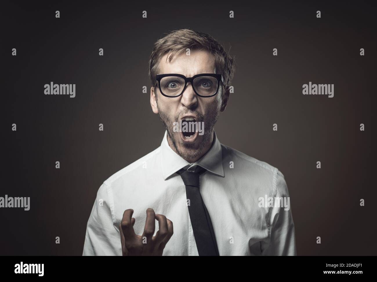 Angry businessman shouting camera hi-res stock photography and images ...