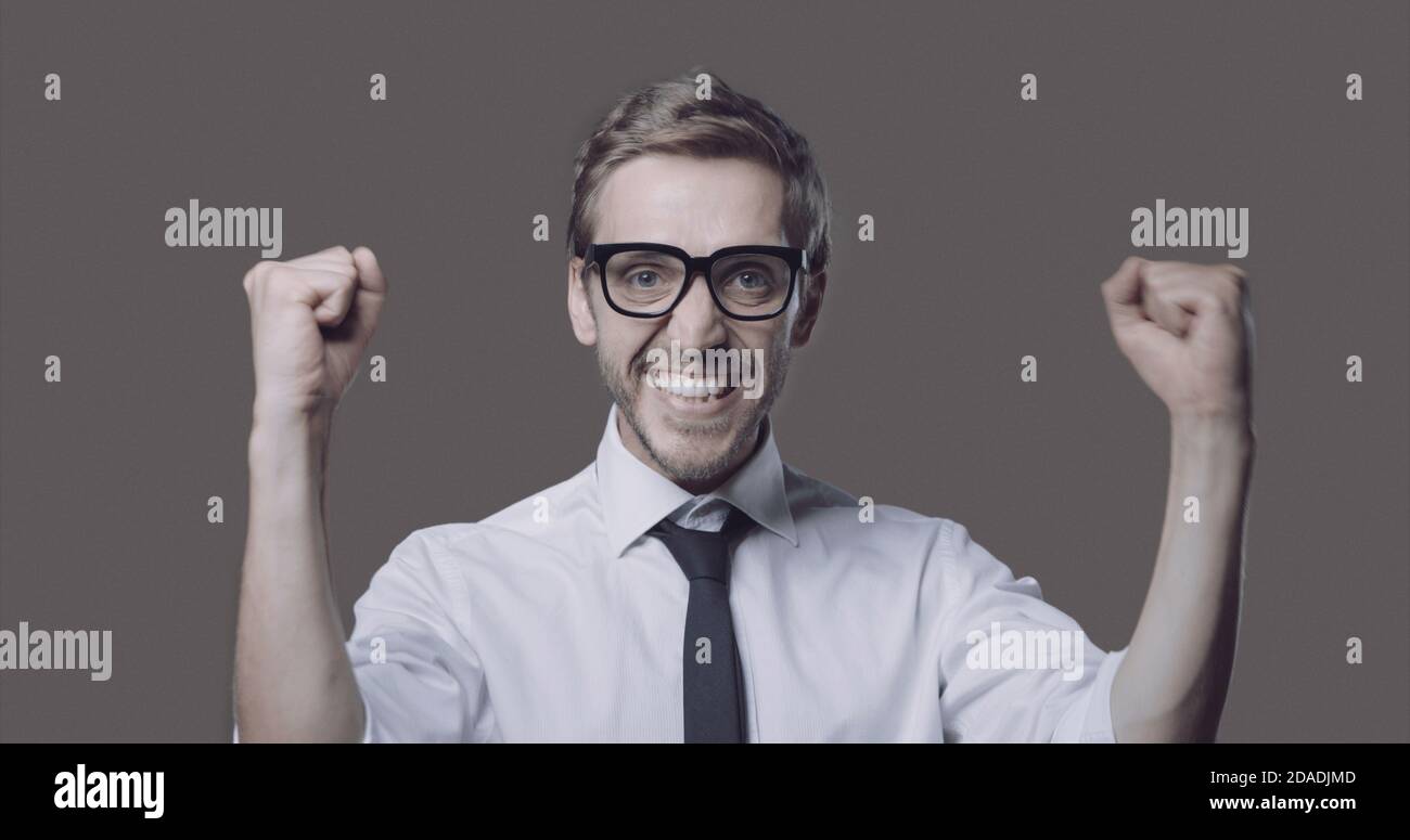 Man expressing excitement celebrating achievement hi-res stock ...