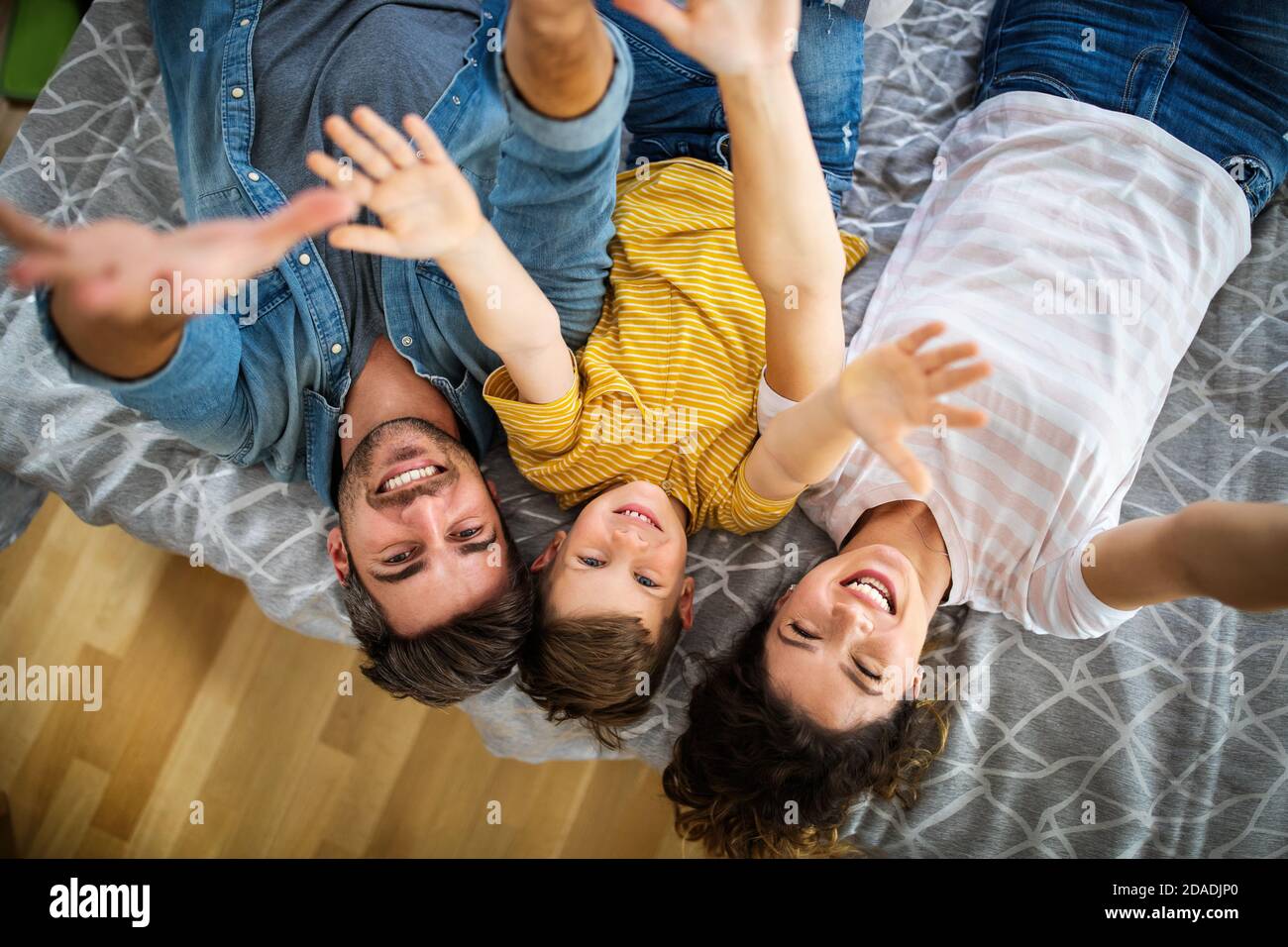 Happy family having fun time at home Stock Photo - Alamy