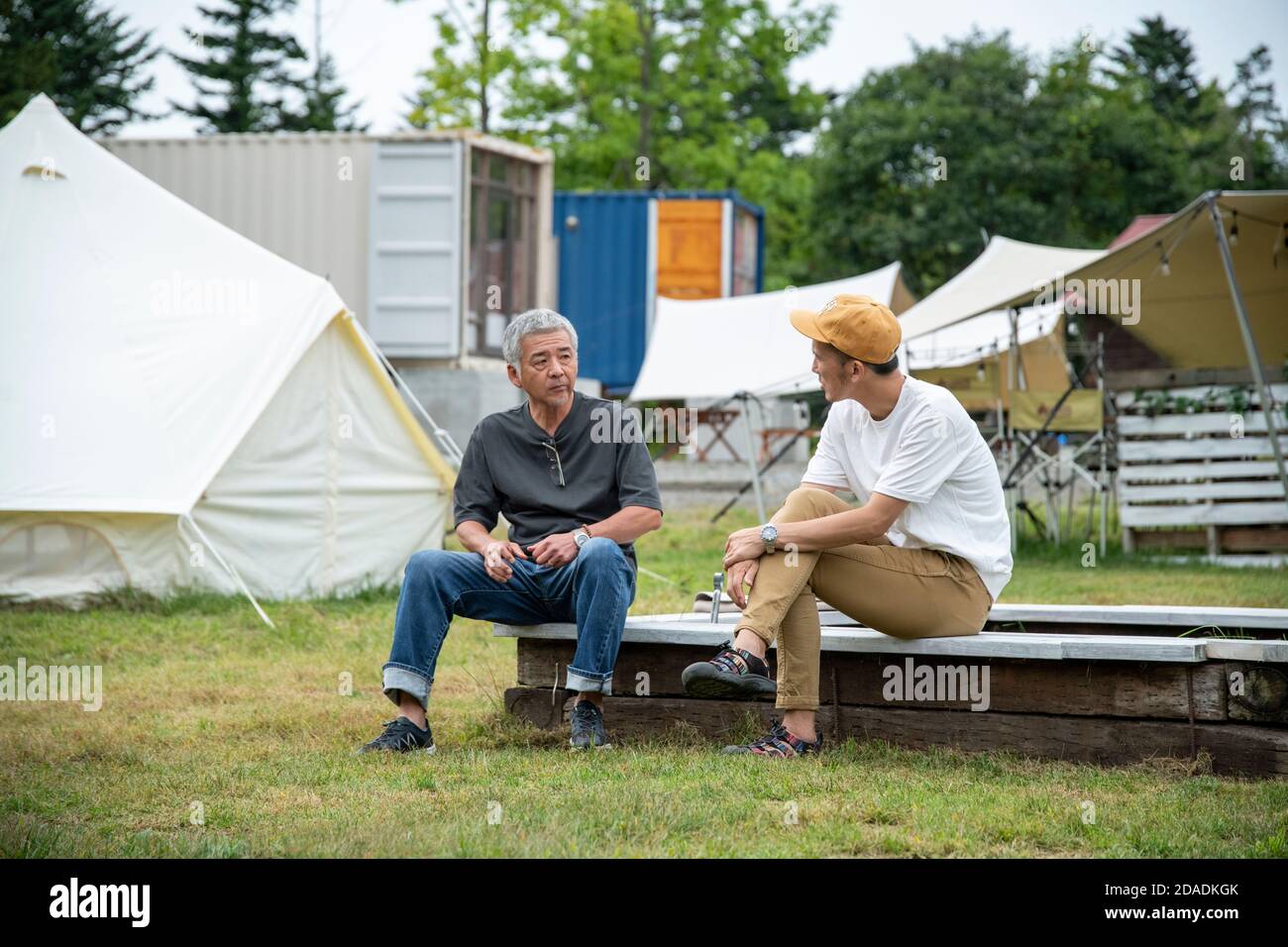 Men in the Camp Site Stock Photo - Alamy