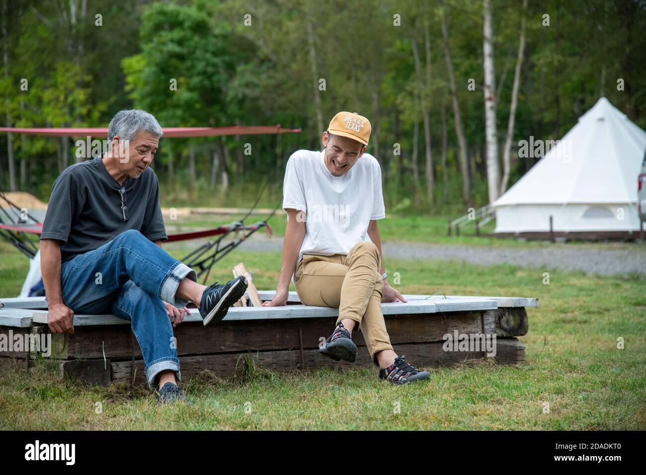 Men in the Camp Site Stock Photo - Alamy