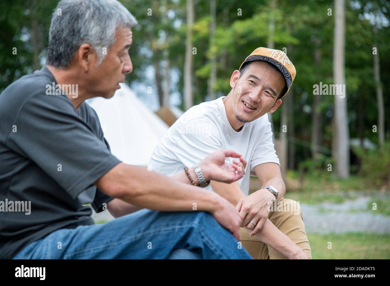 Men in the Camp Site Stock Photo - Alamy