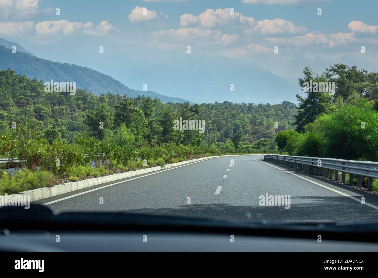 view from the car on the road. View inside moving car road. travel by ...