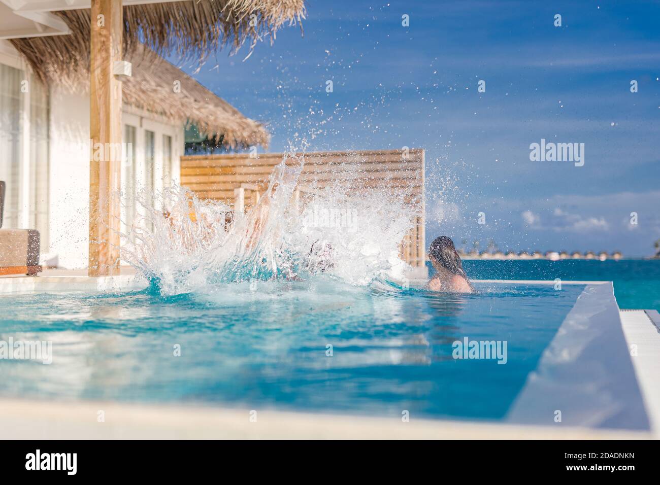 Man jumping swimming pool hi-res stock photography and images - Alamy