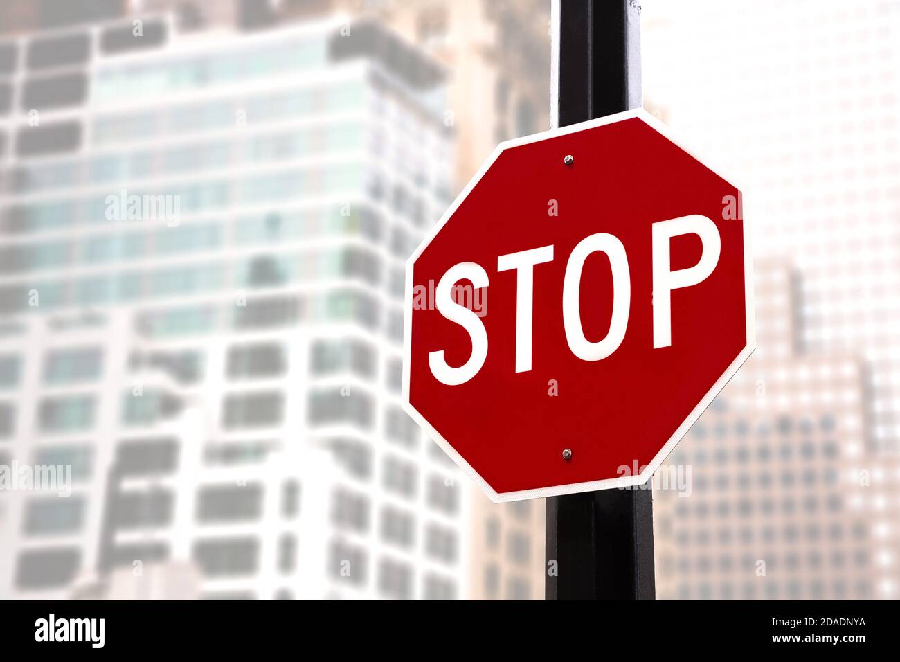 Stop sign on the street of New York City in Manhattan Stock Photo - Alamy