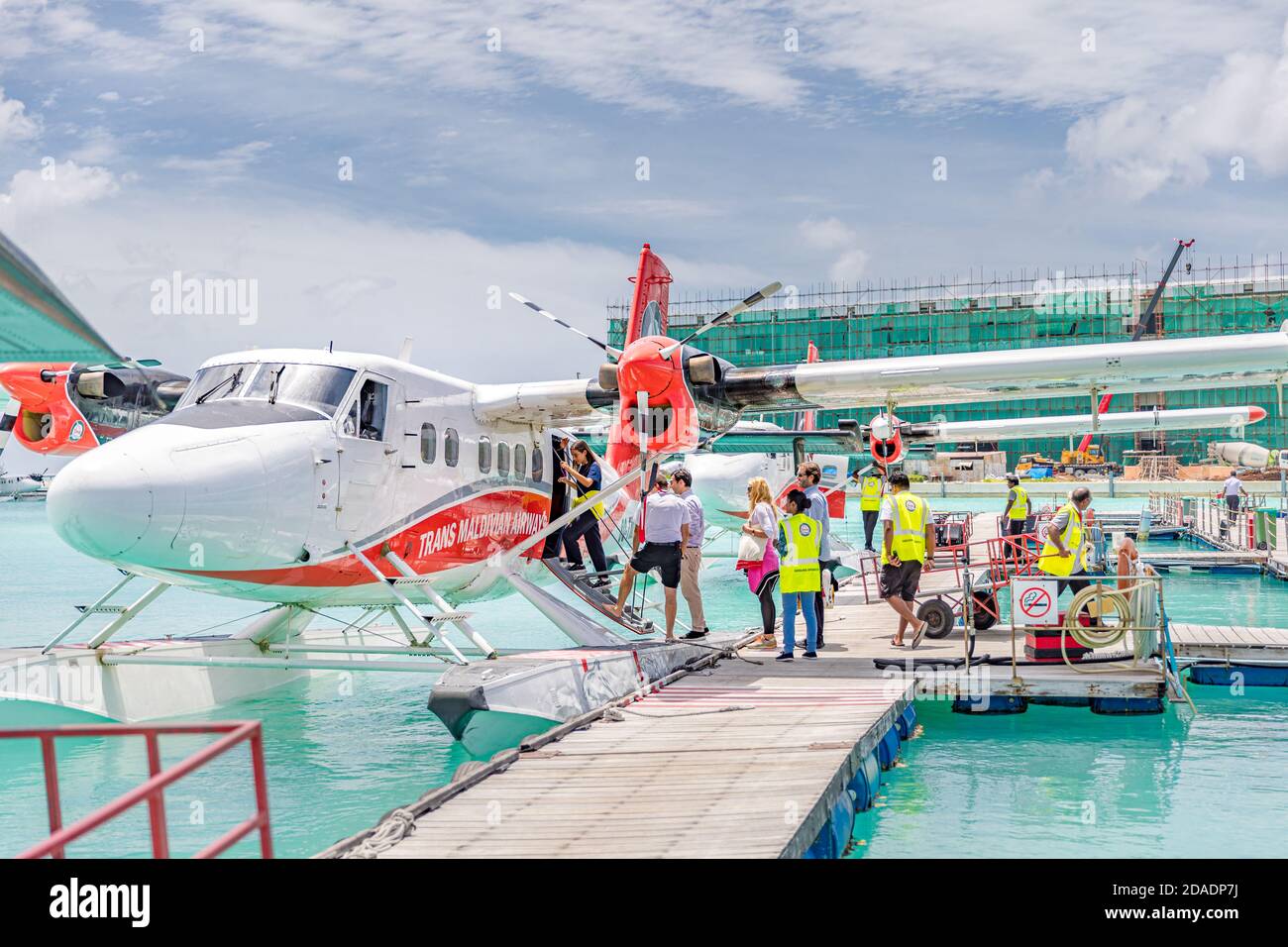 Male, Maldives - 14.08.19: Passengers are boarding seaplane at Male ...