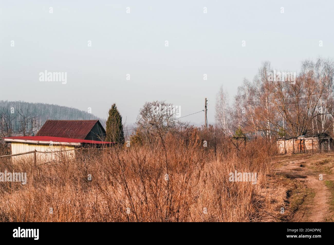 wooden houses in a small village in spring Stock Photo - Alamy