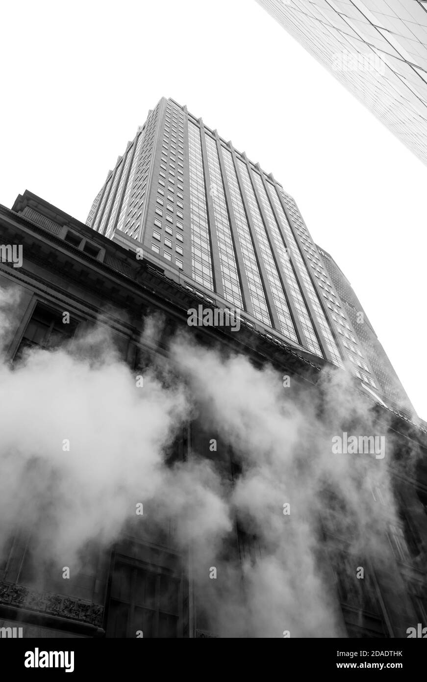 NEW YORK, USA - May 03, 2016: Manhattan street scene. Cloud of vapor ...