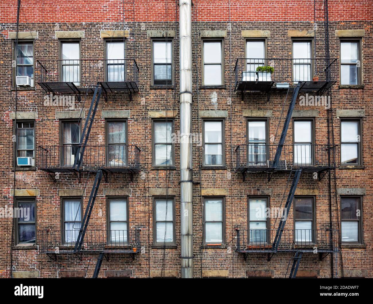 Escape fire ladders at house facades in New York. Manhattan, NYC, USA ...