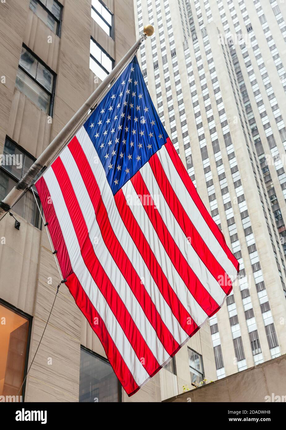 NEW YORK, USA - May 01, 2016: American flag on the Rockefeller Center ...