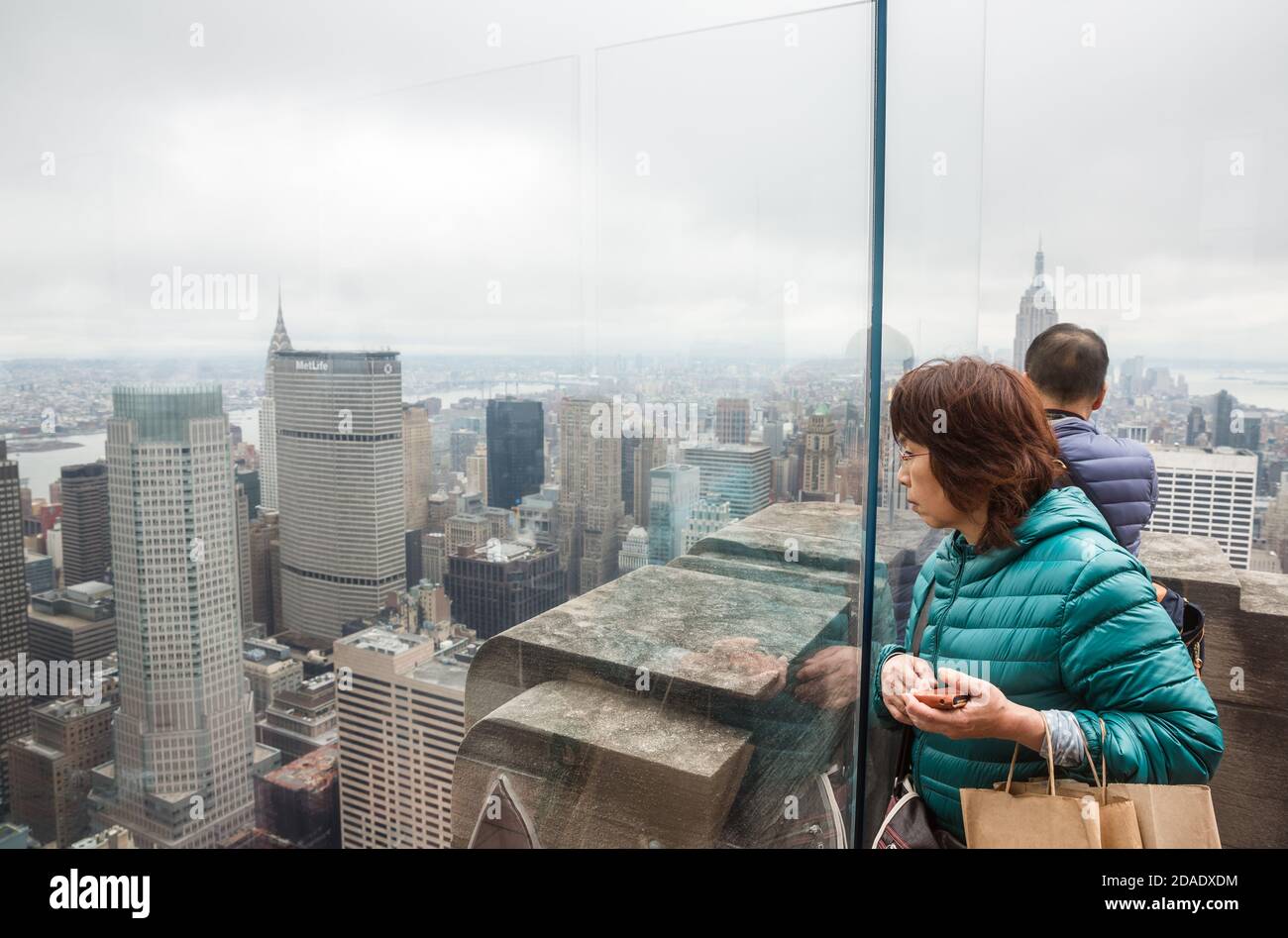 NEW YORK, USA - May 03, 2016: Rockefeller Center in NYC. Tourists at ...