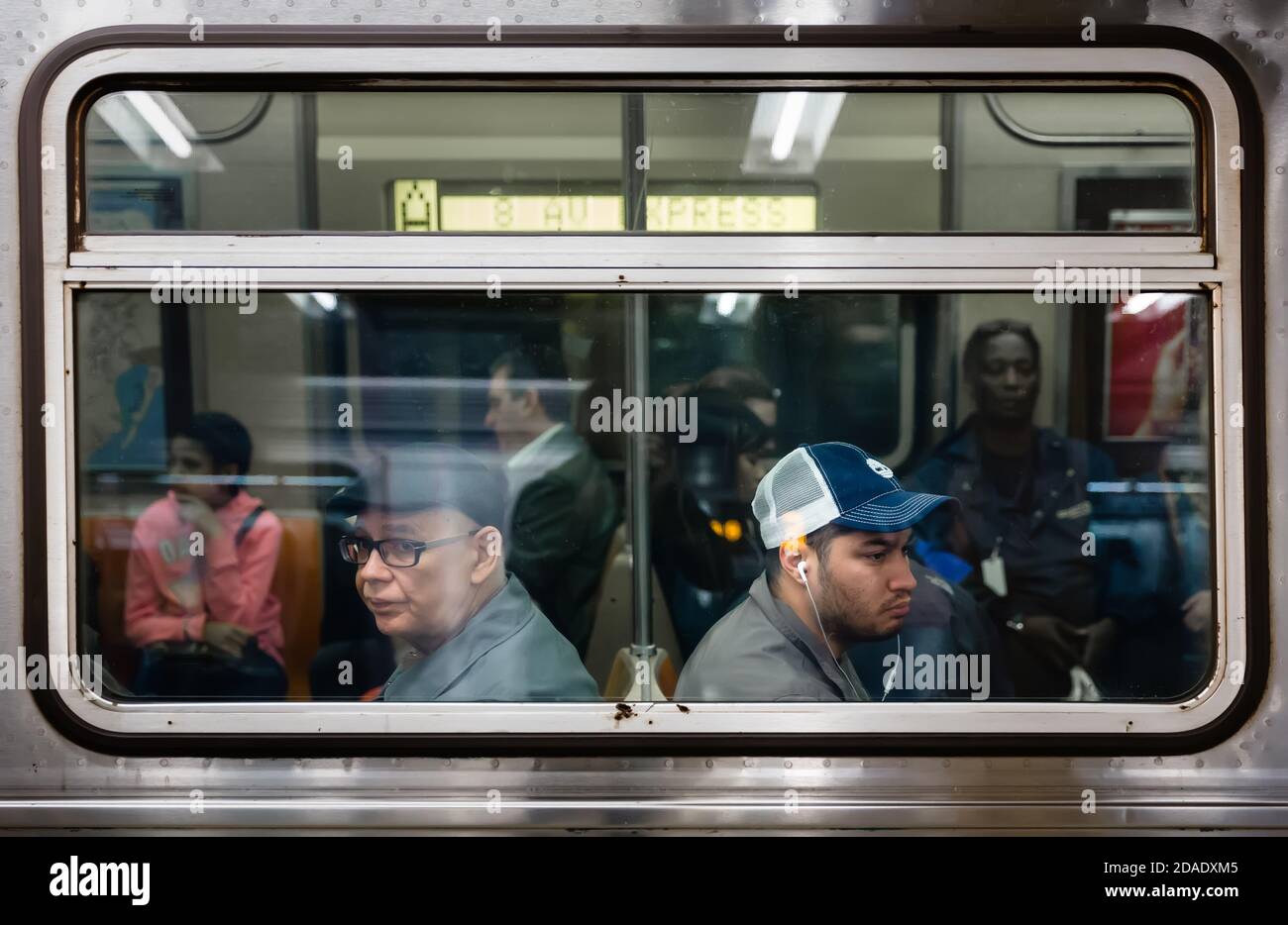 NEW YORK, USA - May 01, 2016: Elderly man with glasses and young man ...