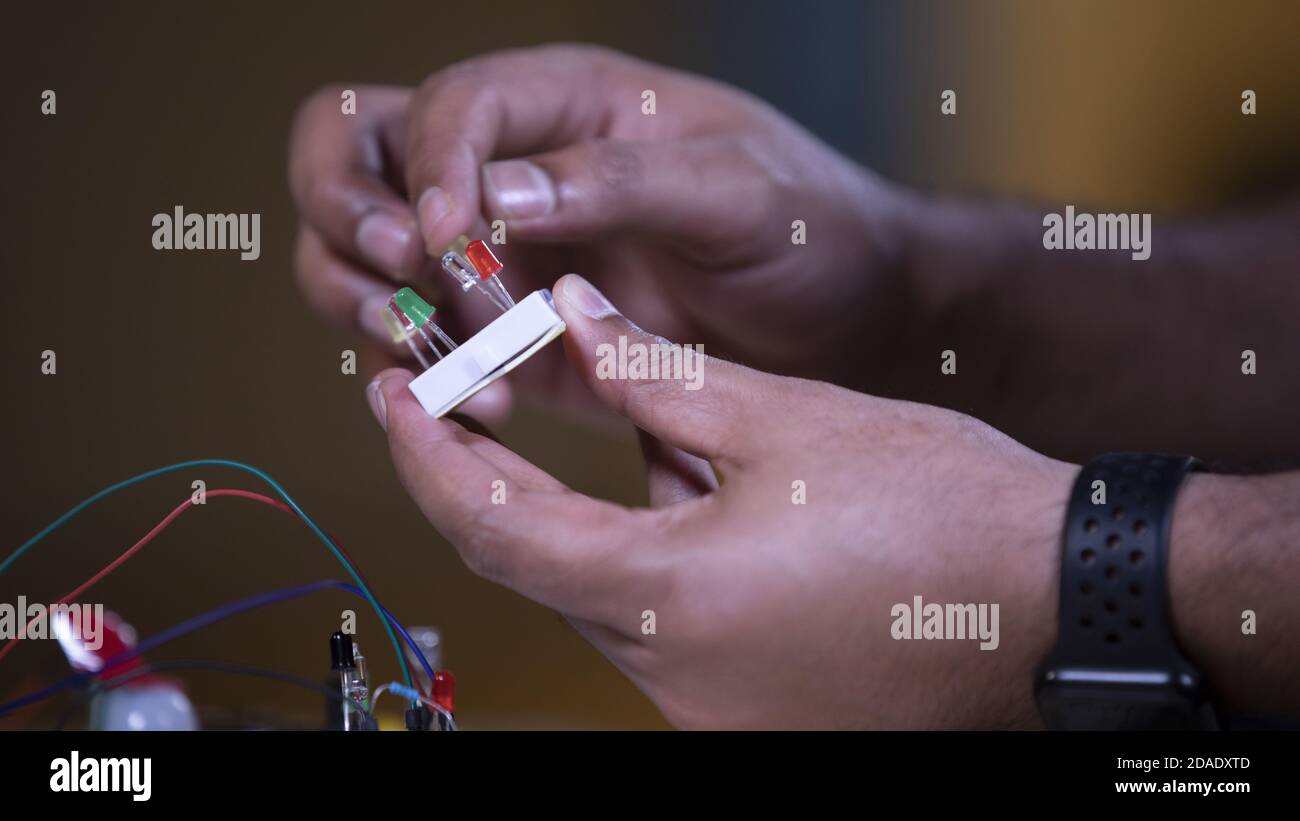 Man connecting LED on PCB circuit Stock Photo - Alamy