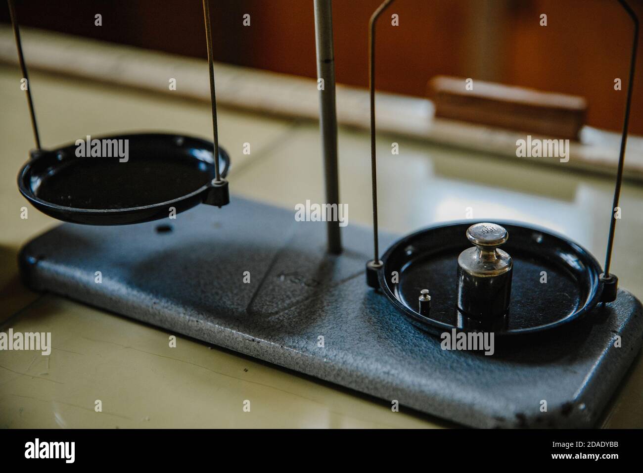 Closeup shot of an old laboratory scale for experiments with a metal ...