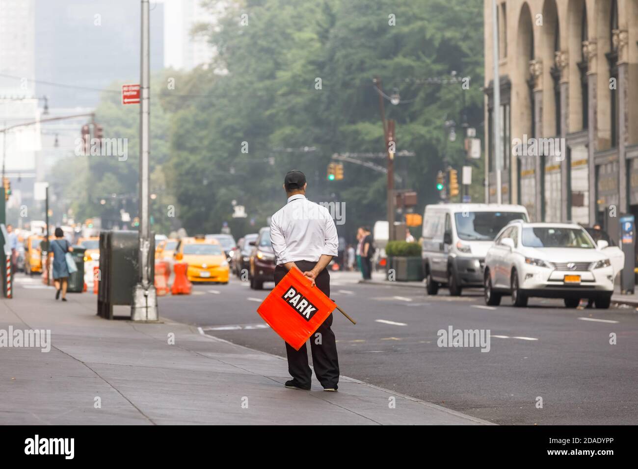 NEW YORK, USA - Sep 16, 2017: Manhattan street scene. Cars parker on ...