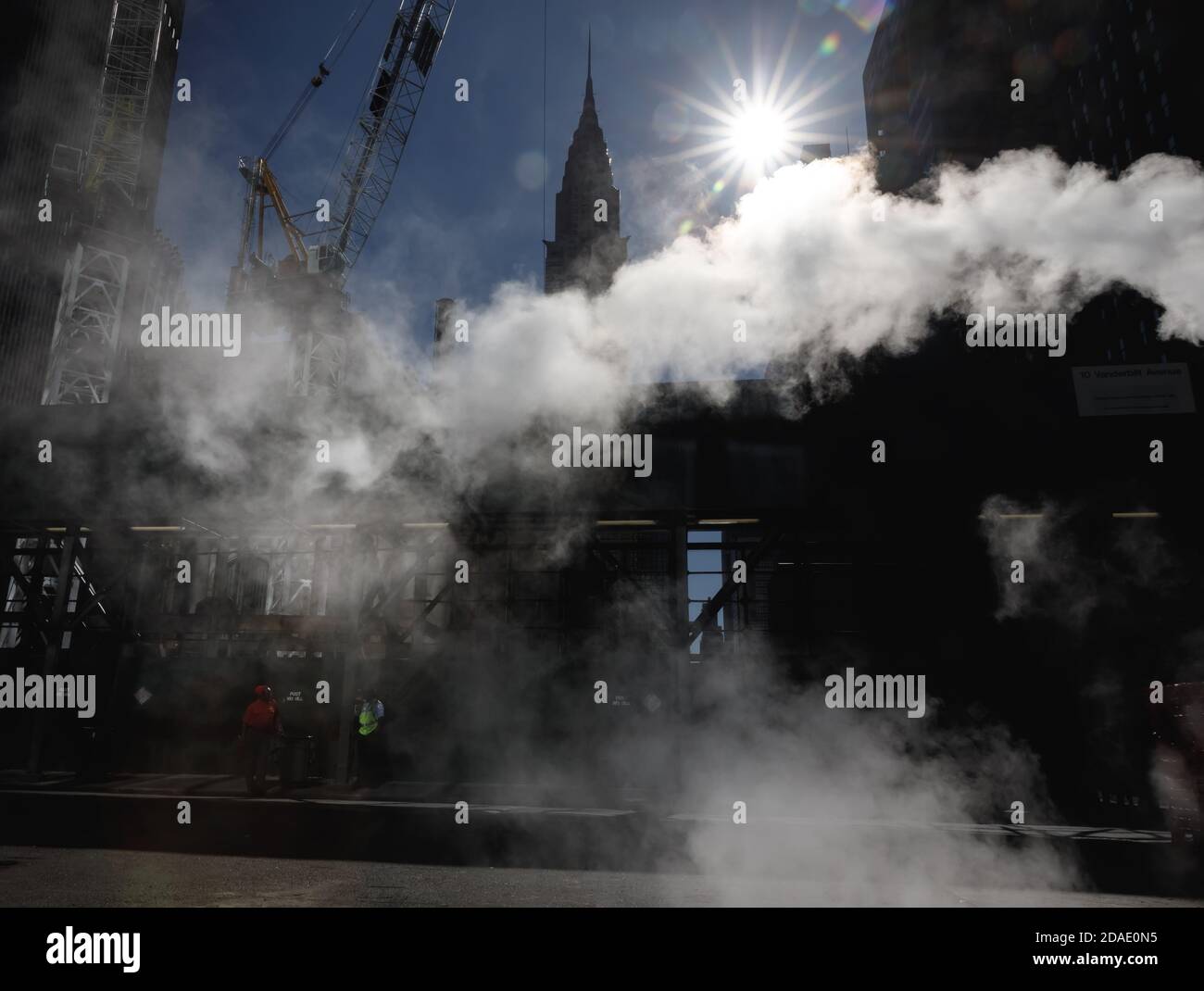 NEW YORK, USA - Sep 23, 2017: Manhattan street scene. Cloud of vapor ...
