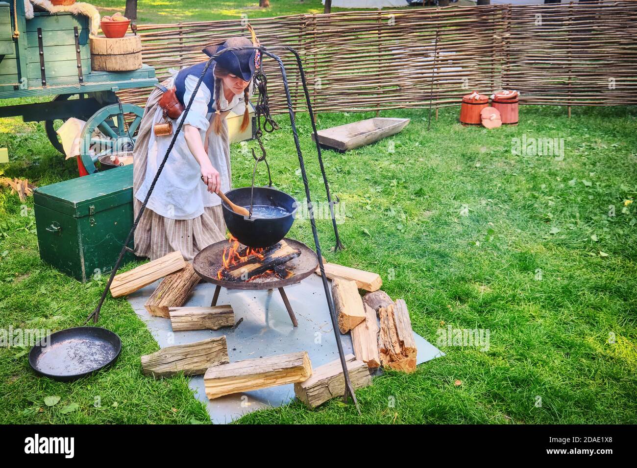 Moscow Russia 06 07 2019: A young woman in a vintage style prepares ...