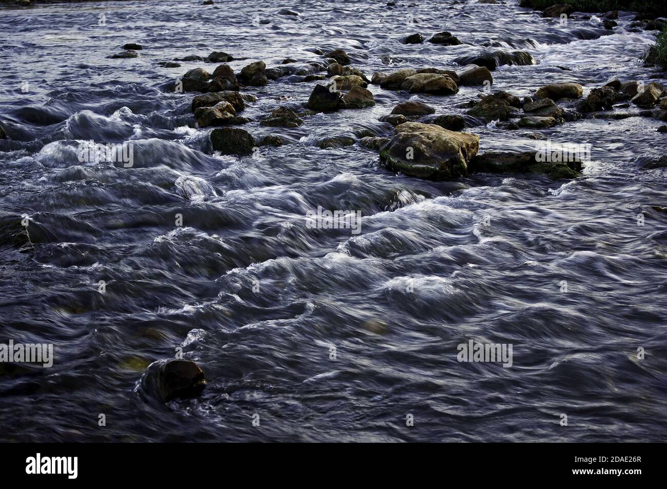 The river current at dawn Stock Photo - Alamy
