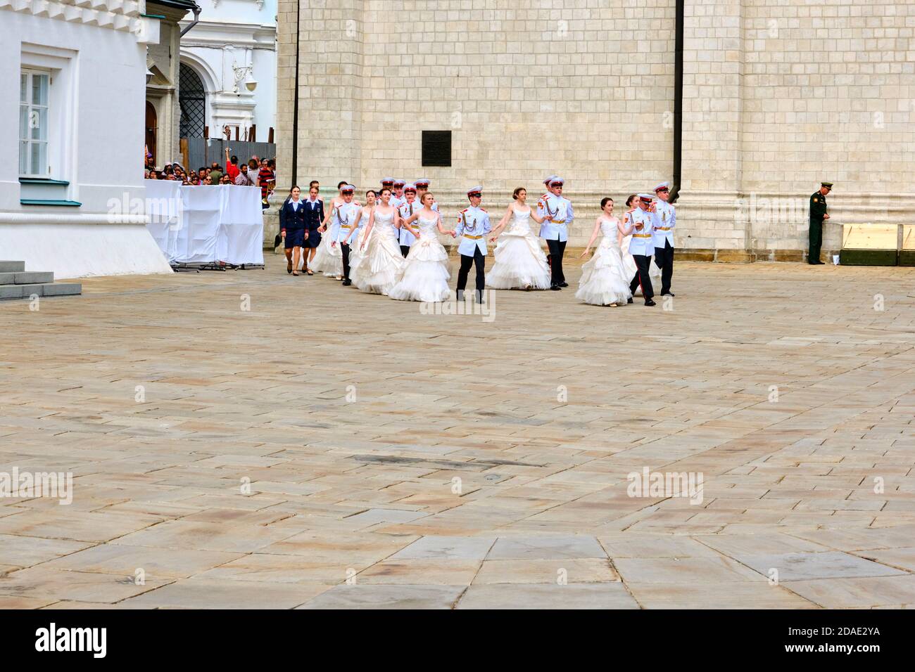 Graduation party cadet school in the Kremlin. Men in white uniforms and ...