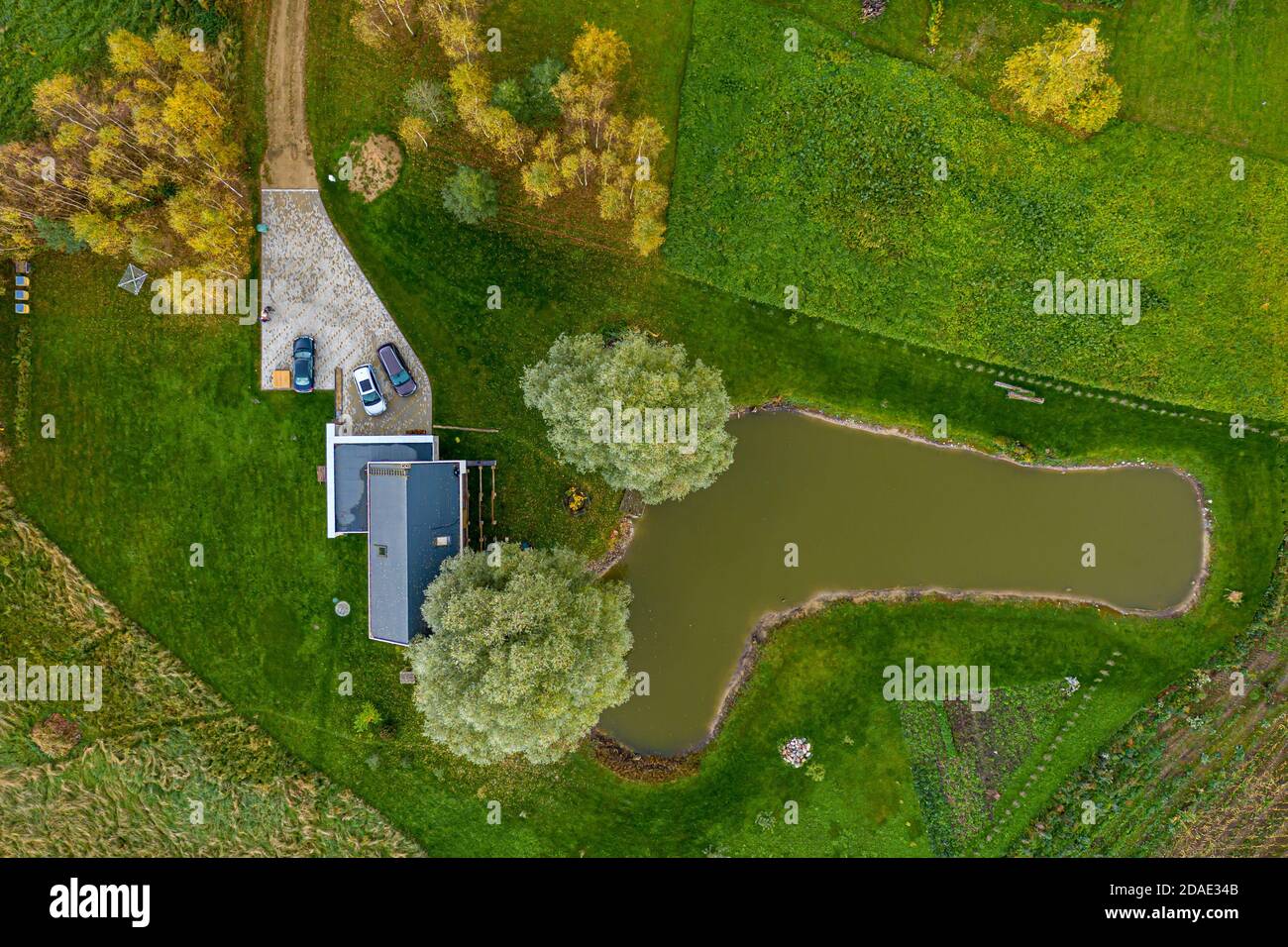 view from above of a country homestead with a pond Stock Photo - Alamy
