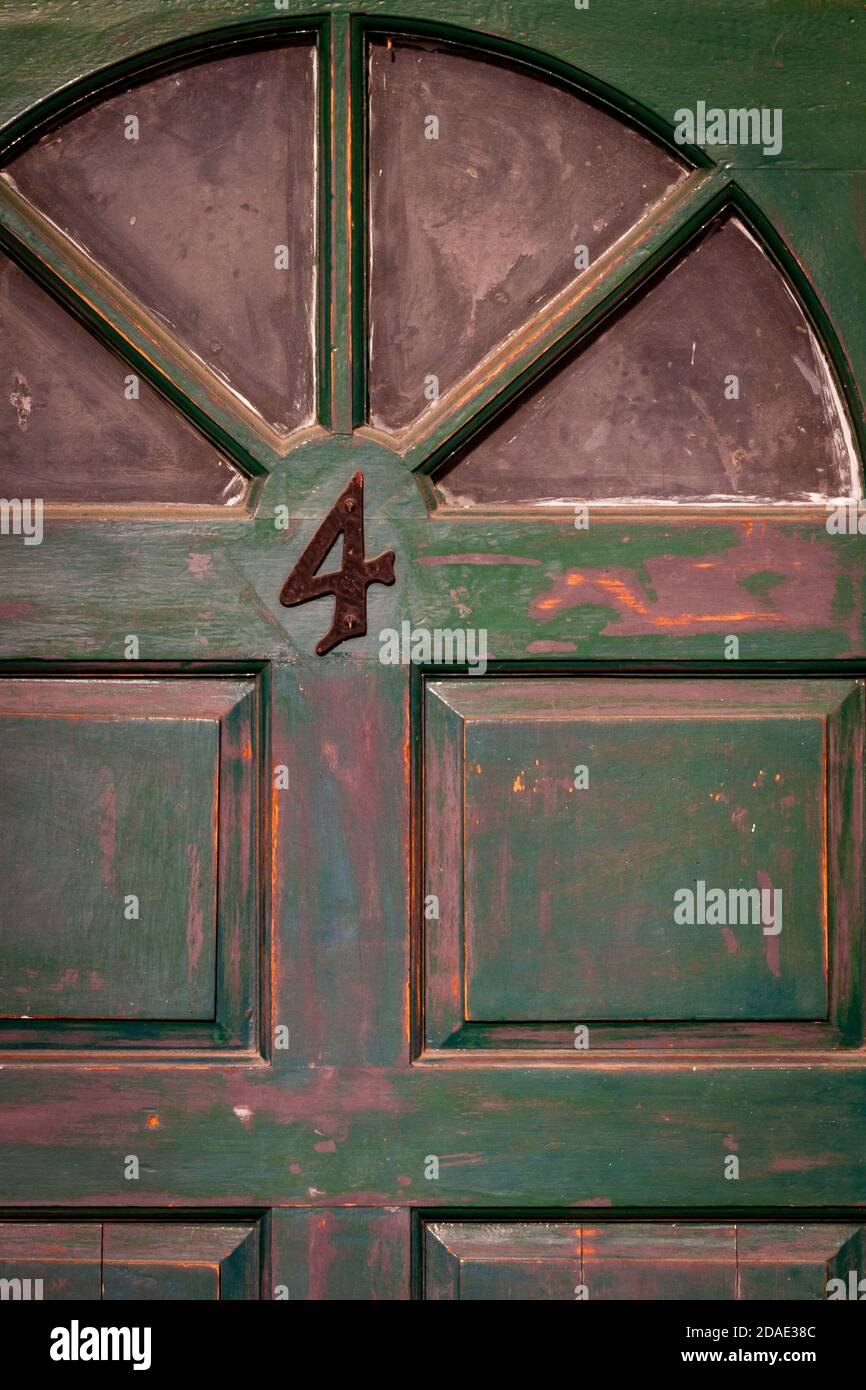 on a worn and weathered wooden front door Stock Photo - Alamy