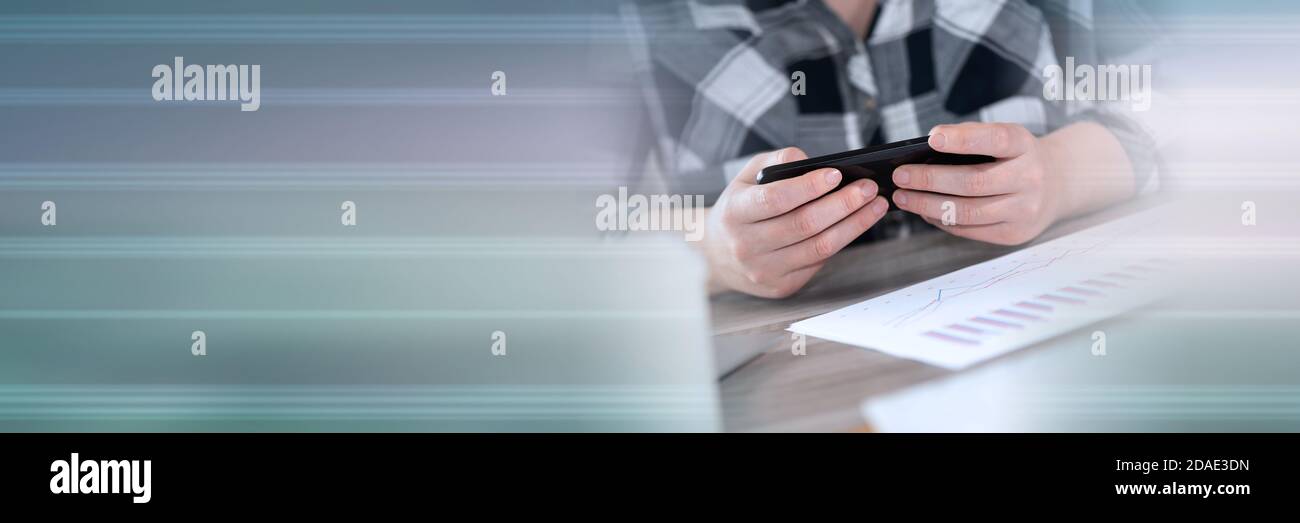 Female hands using a mobile phone; panoramic banner Stock Photo - Alamy