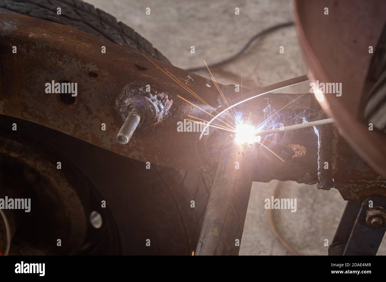 Welding Metal Pipe of Car Chassis by Welding Worker or Welder Man on ...